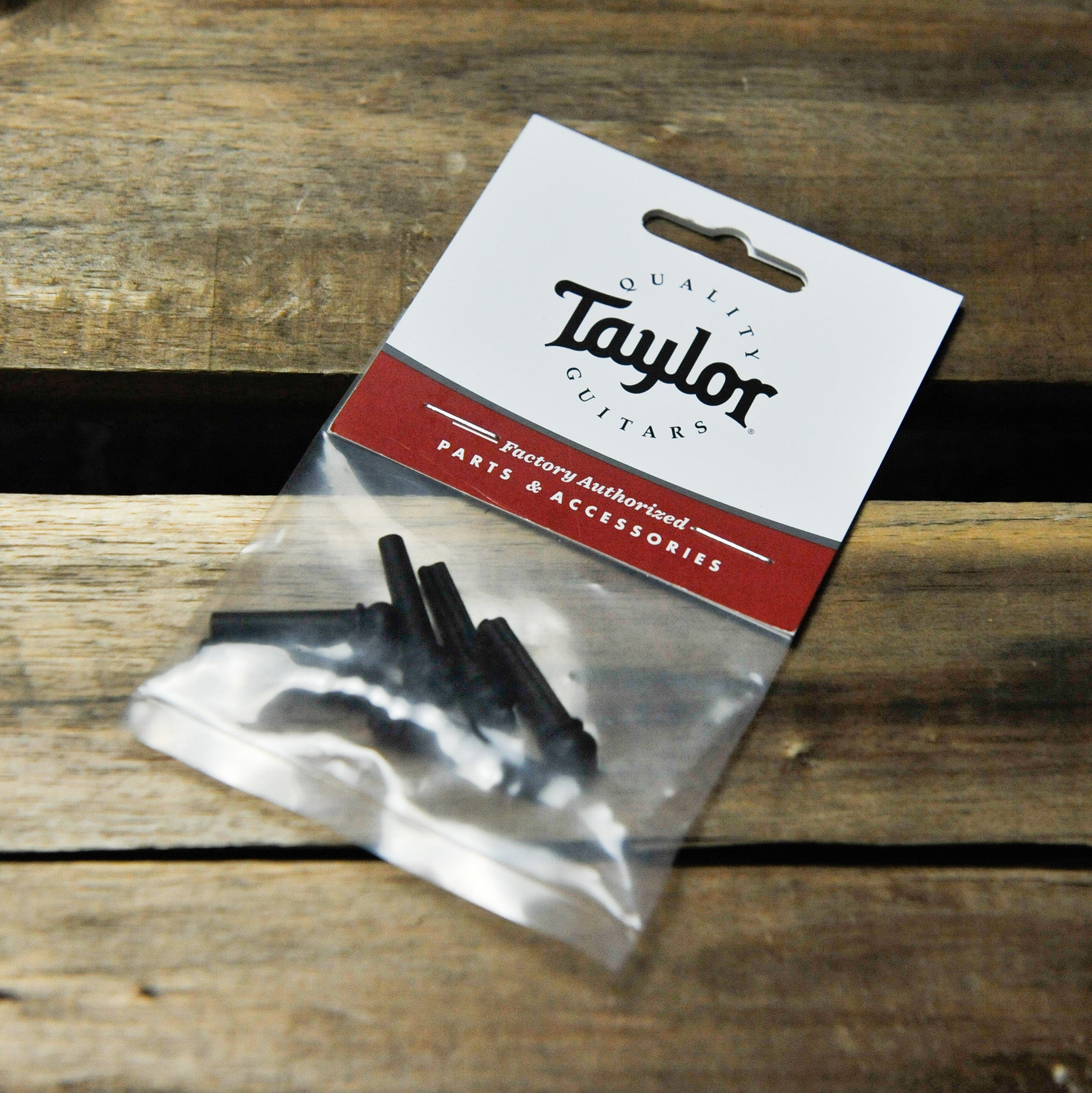 Taylor Bridge Pins, Ebony with Abalone x 6 – Gladesville Guitar Factory